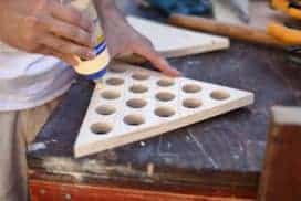 How to make a DIY Triangle Peg Game - TheDIYPlan