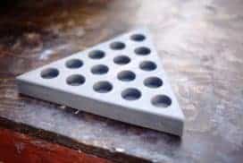 How to make a DIY Triangle Peg Game - TheDIYPlan