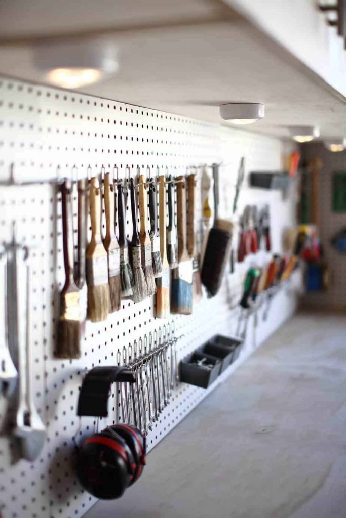 How to Install and Organize DIY Pegboard Wall - TheDIYPlan