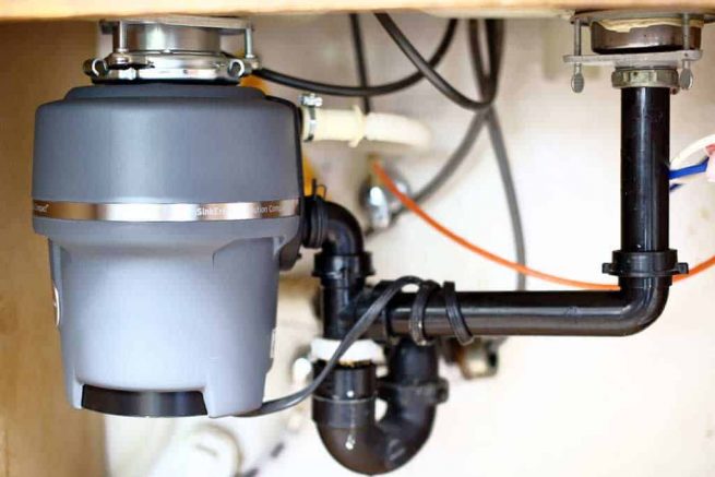 How to Replace a Garbage Disposal in a Sink - TheDIYPlan